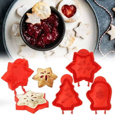 Wilton Non-Stick Christmas Cookie Shapes Pan, 12-Cavity Gingerbread Man ...