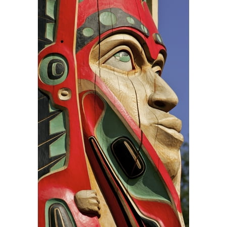 Close Up Of A Face On A Traditional Haida Totem Carving In Ketchikan ...