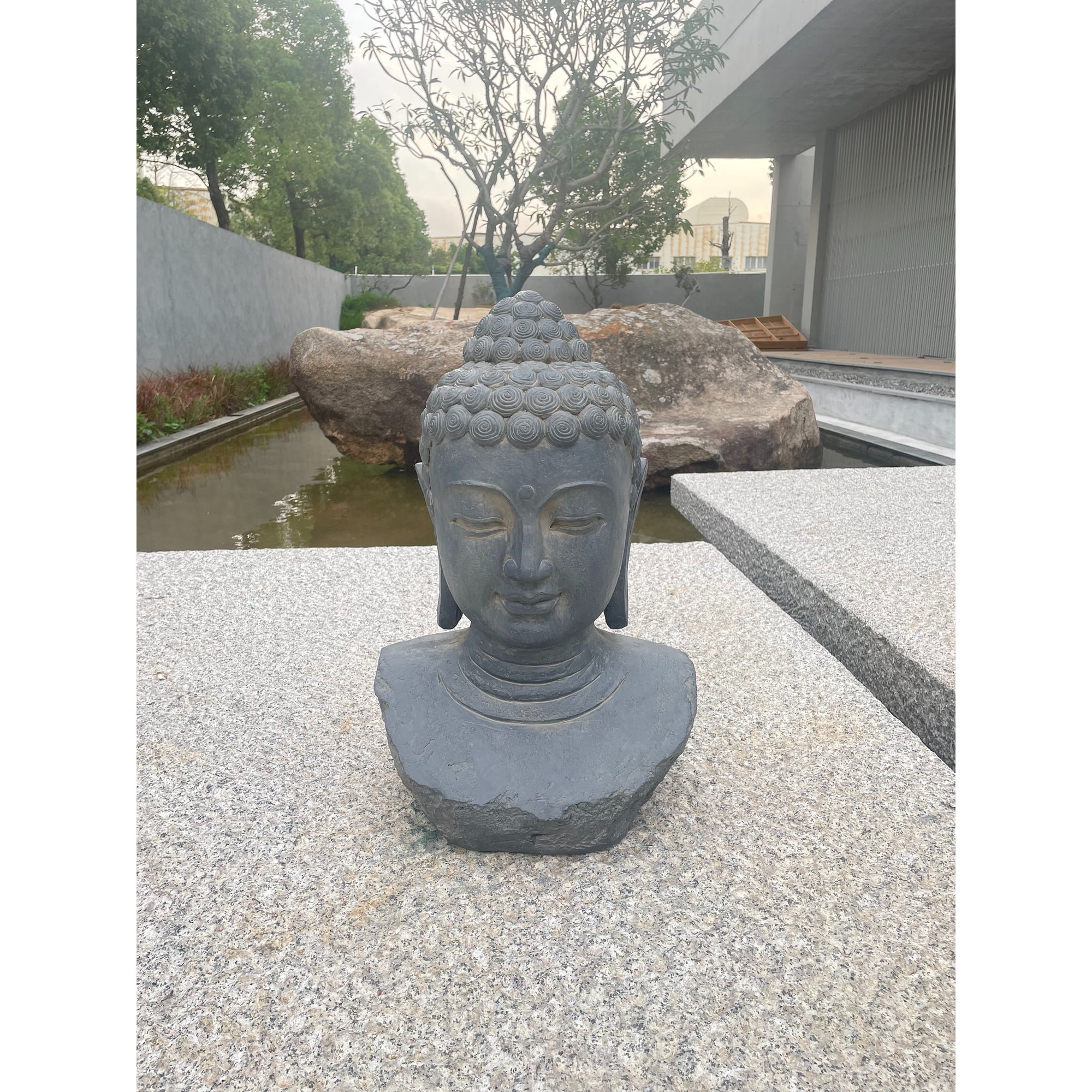 Click here for Hi-Line Gift Zen Buddha Head Statue Garden Display... prices
