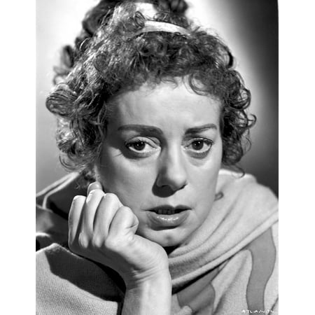 Elsa Lancaster on a Printed Top and Face Leaning on Closed Hands Photo ...