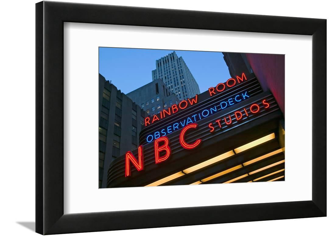 Neon lights of NBC Studios and Rainbow Room at Rockefeller Center, New ...