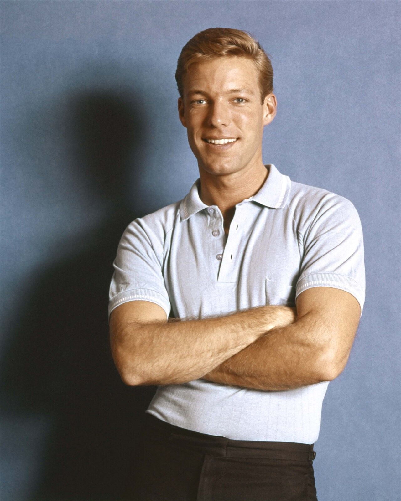Richard Chamberlain smiling 1960s studio portrait in white polo shirt ...