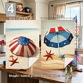blue and white kitchen towels A red white and blue umbrella sitting on ...