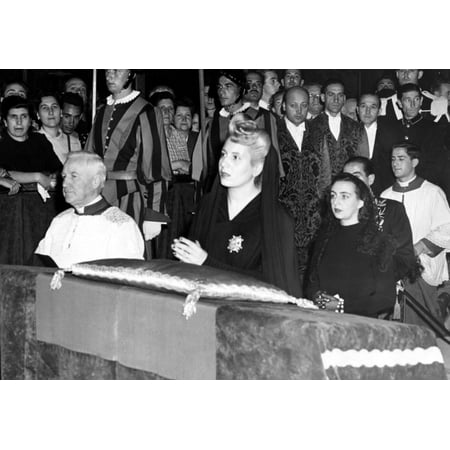 Eva Peron Kneels In Prayer At The Main Altar Of St. Peter'S Cathedral ...