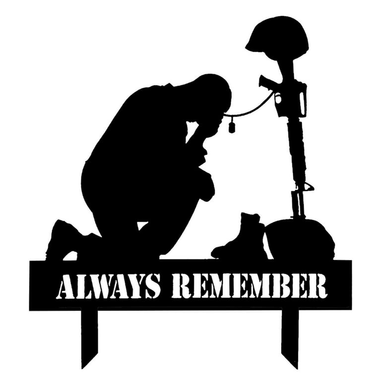 Soldier Kneeling At Memorial