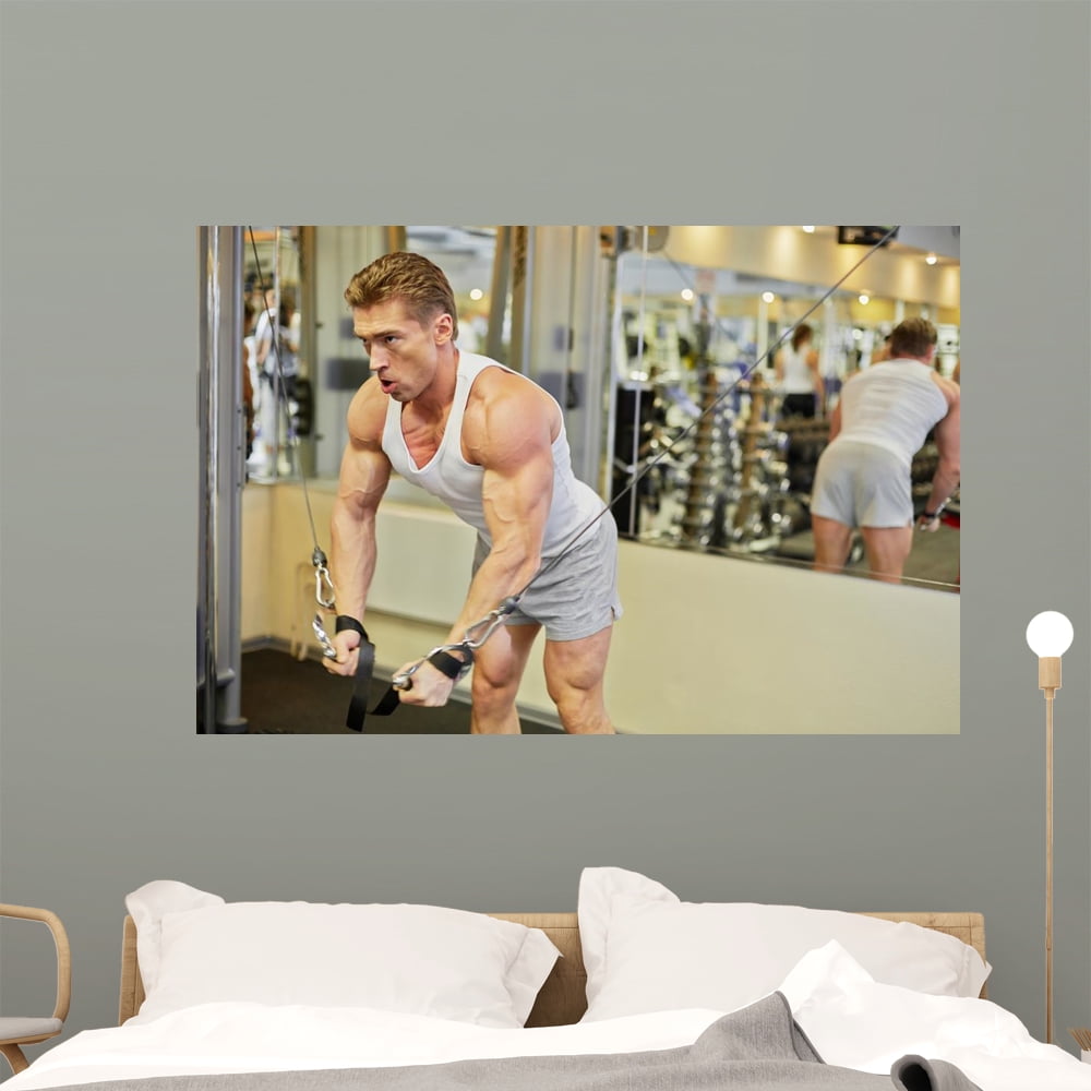 Bodybuilder Does Shoulders Exercises Wall Mural Decal by Wallmonkeys ...