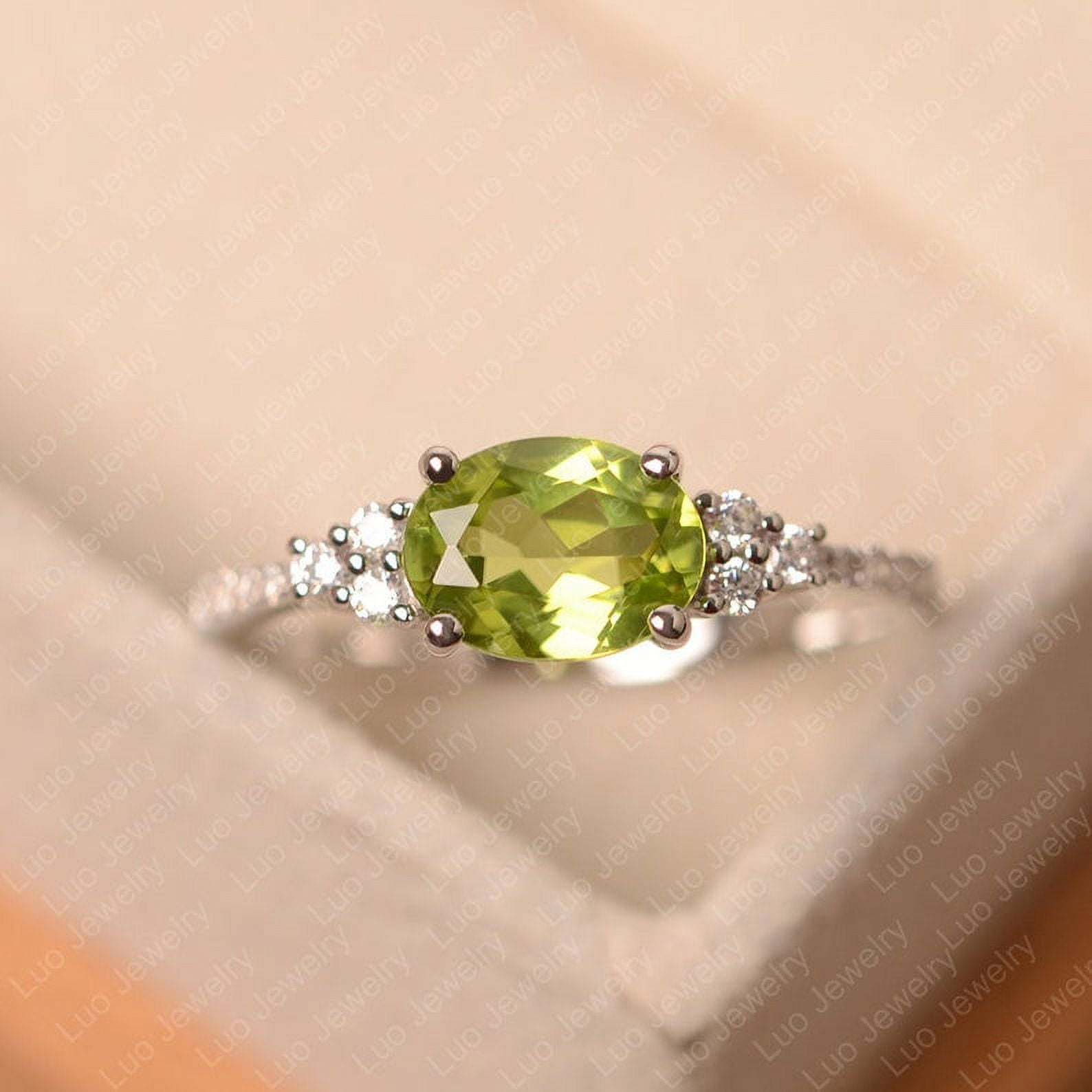 Click here for Gememporium Green Peridot Ring  Oval Cut  August B... prices