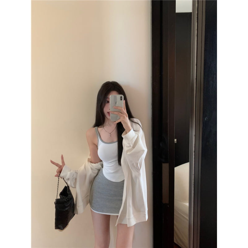 Traje tipo cárdigan con falda corta y chaleco deportivo, informal ...