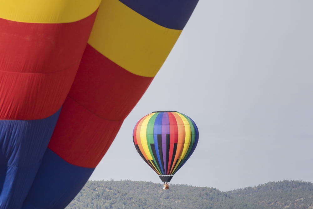 Hot air balloon bringing color to the sky. Poster Print by Larry Ditto ...