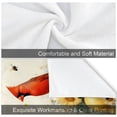 A red bird sitting on top of a bunch of lemonskitchen dish towels4 ...