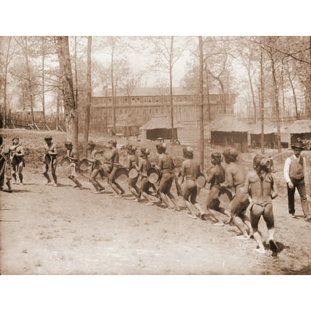 Igorot Men From The Philippines Dance In A Semi-Circle. The Huts In The ...