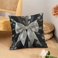 Black and white Damascus pattern close-up with silver bow, pillow cover ...