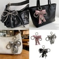Bowknot Shape Key Rings With Pearls And Metallic Heart Decoration ...