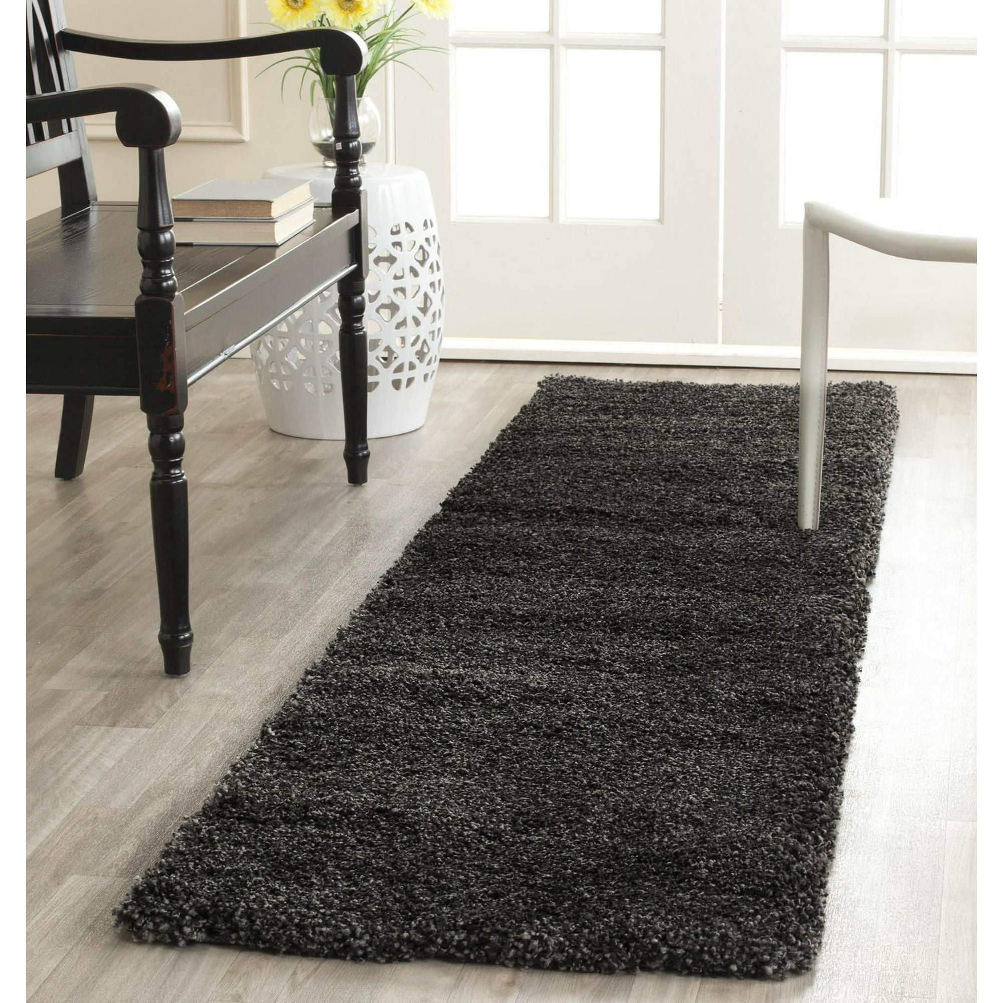 Click here for Safavieh Milan Harlow Solid Shag Area Rug 2 Ft. X... prices