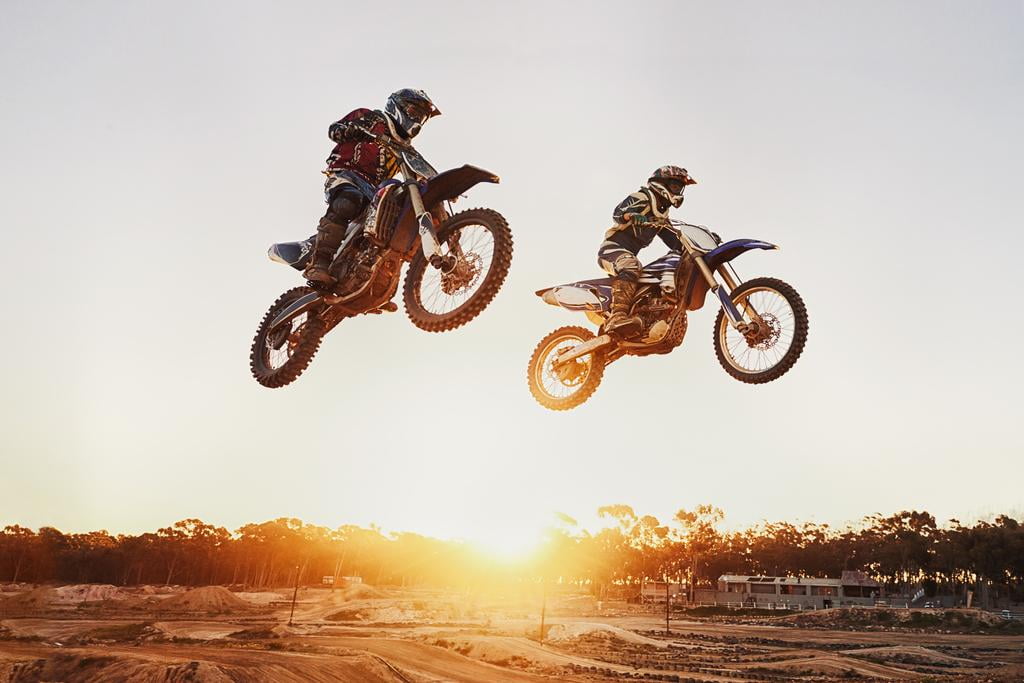 Motocross Riders Jumping Over Sunset Motorcycle Bike Photo Photograph ...