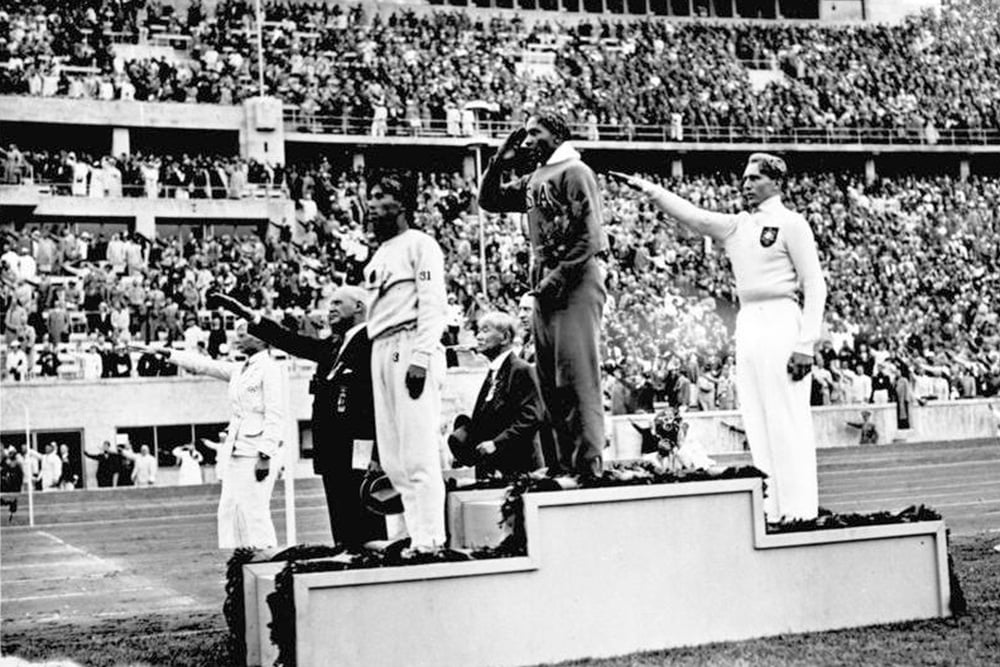 24"x36" Gallery Poster, Jesse Owens on the podium after winning the ...