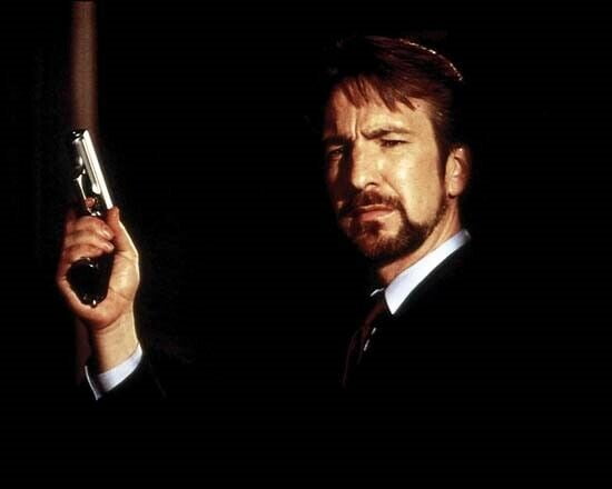 Alan Rickman as Hans Gruber holding gun looking tough in Die Hard 16x20 ...
