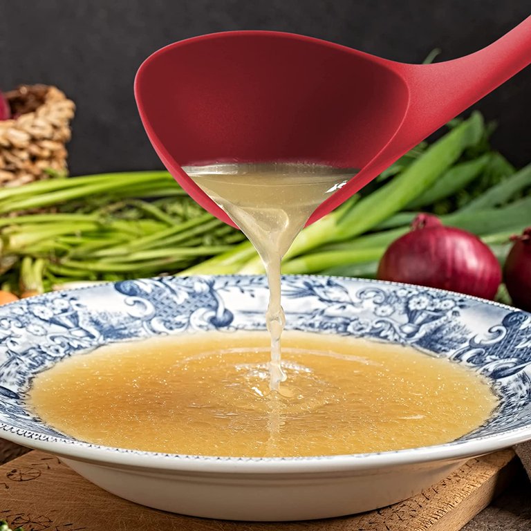 Soup Ladle Pouring Soup