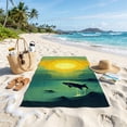 Boho towels A whale jumping out of the water in front of a sunset beach ...