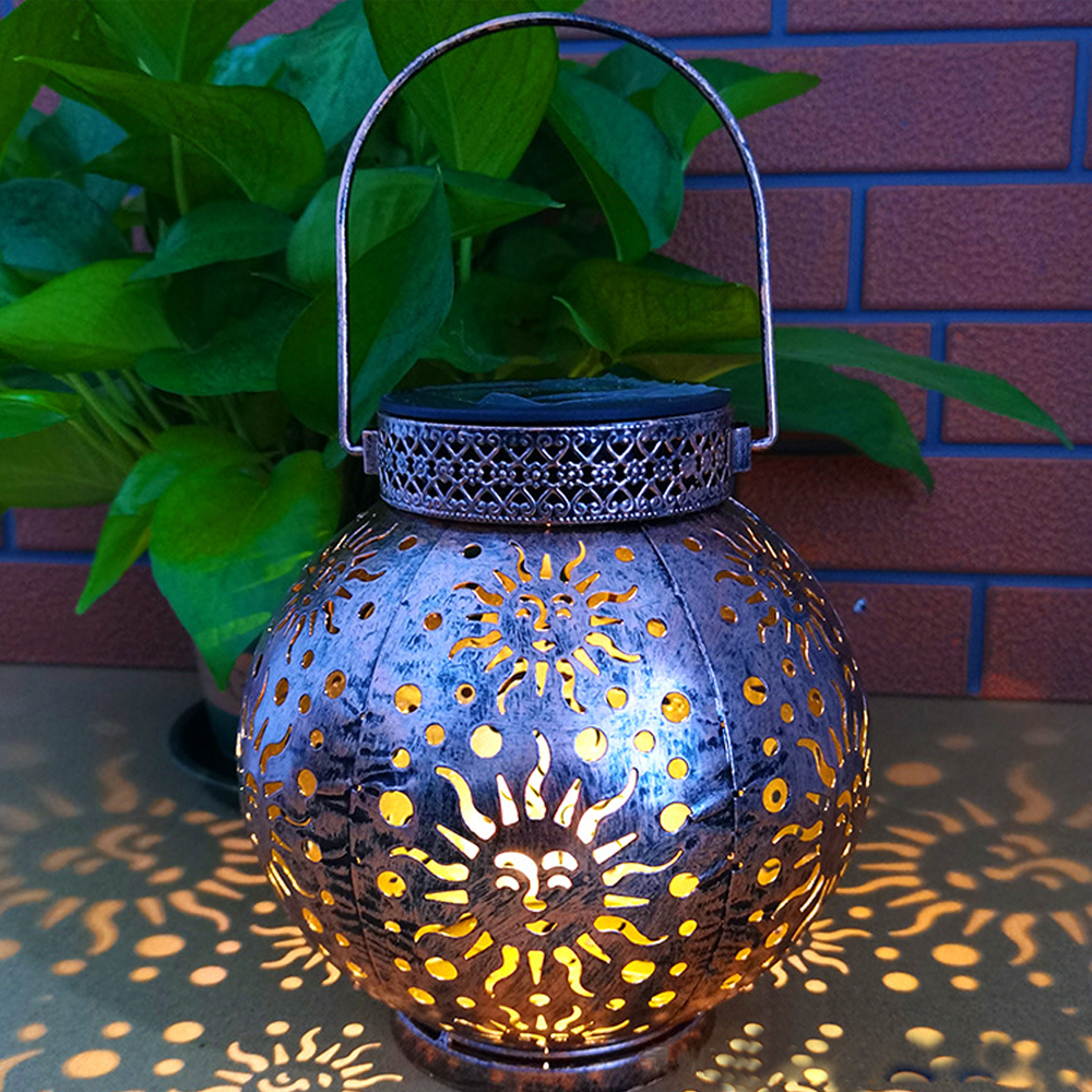 Solar light, wrought iron courtyard sun face projection landscape light ...