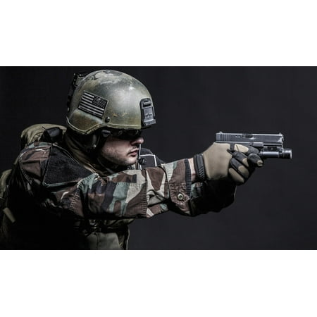 U.S. Marine Corps special operations command Marsoc raider with pistol ...