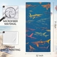 Beach towels with sharks A large group of sharks swimming in the ocean ...