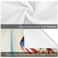 blue and white kitchen towels A red white and blue umbrella sitting on ...