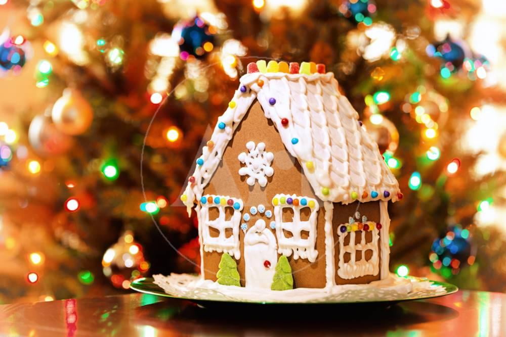 Homemade Christmas Gingerbread House Displayed on a Table Christmas ...