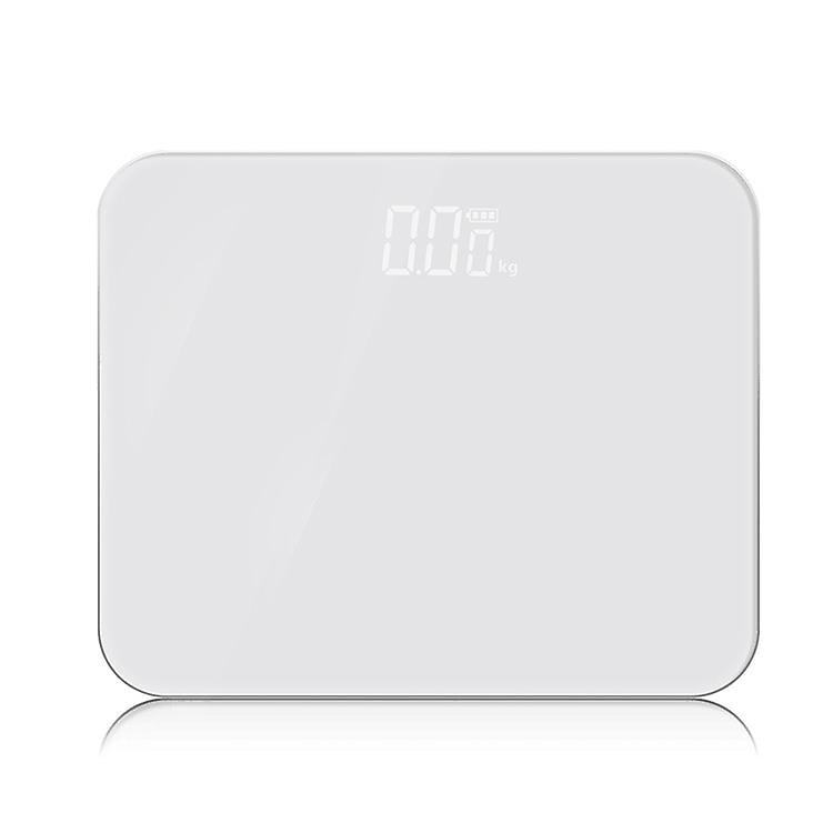Cuerpo humano que pesa el electrónico blanco de Digitaces que pesa 288* ...