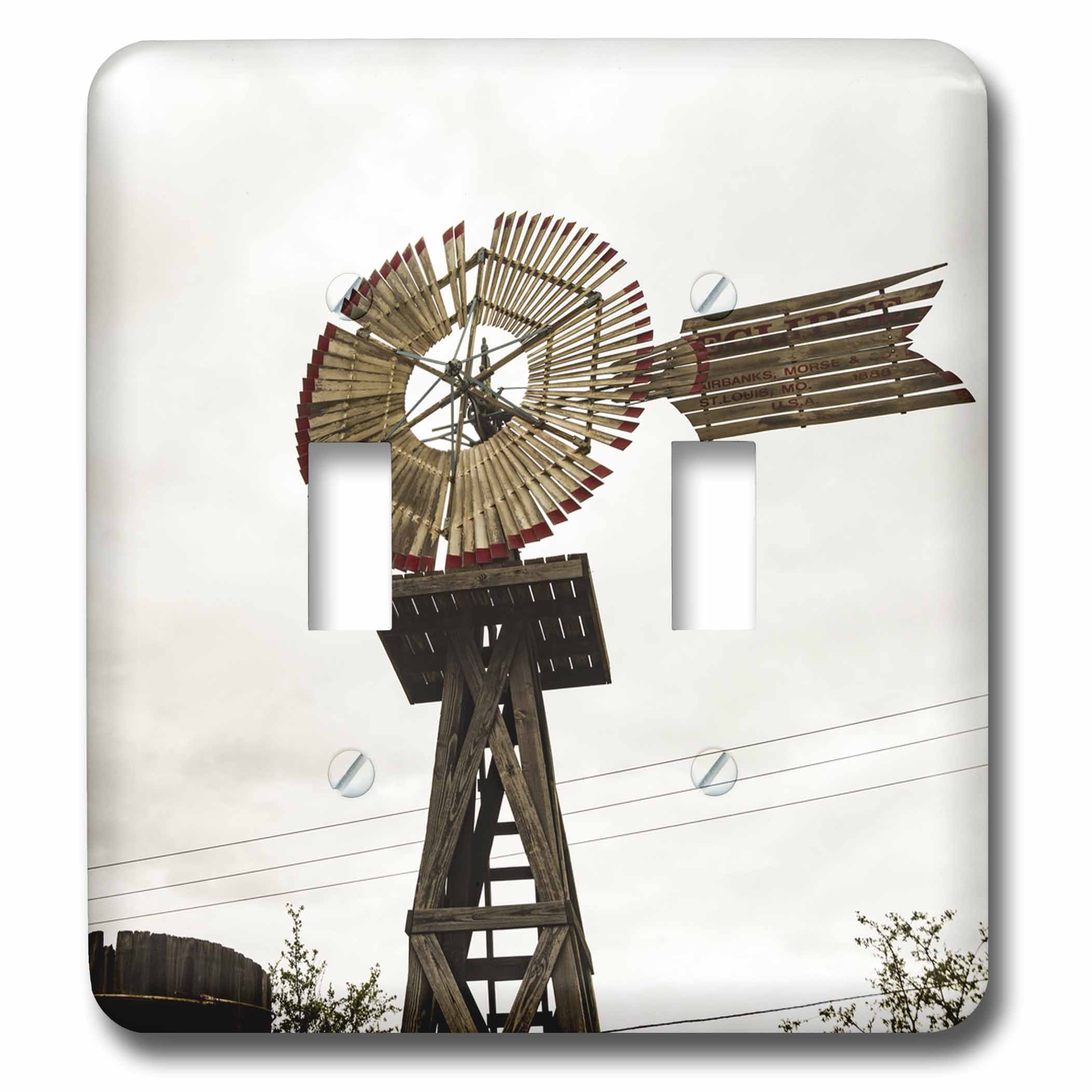 USA, Texas. Stanton, old wooden windmill and water tank. double toggle ...
