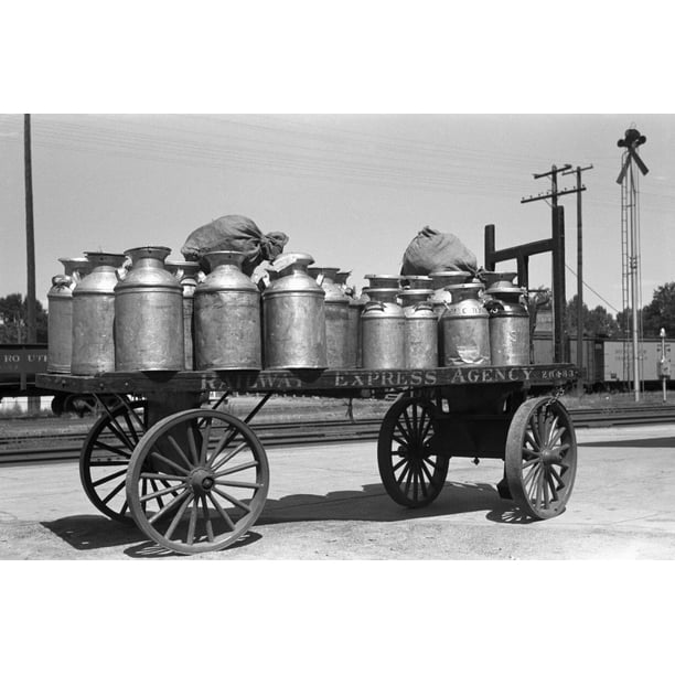 Milk Jugs, 1941. /Nrailway Cart Loaded With Containers Of Milk ...