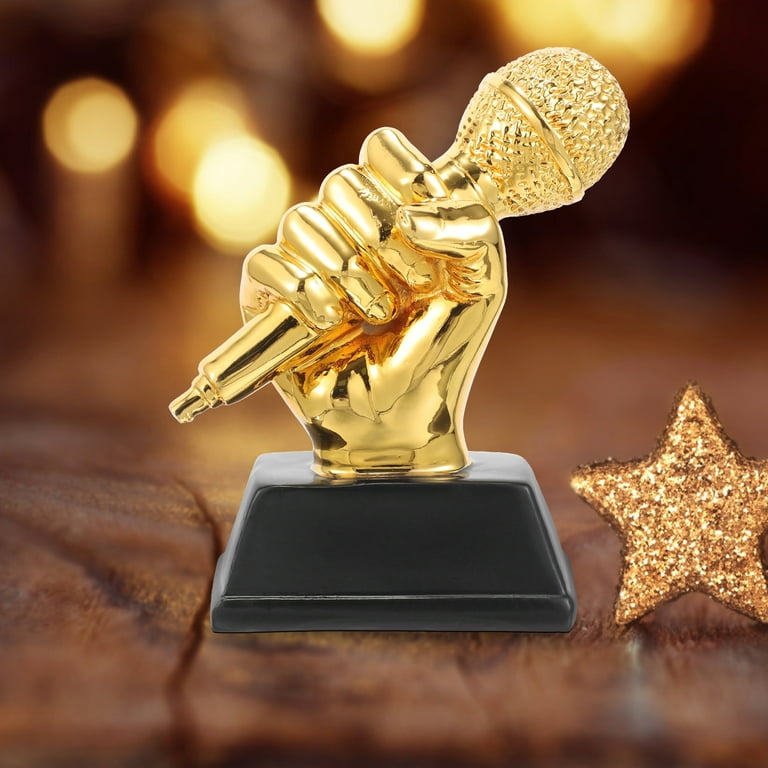 Golden Music Treble Clef With Microphone Award Trophy On A White ...