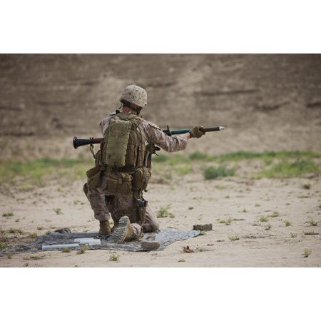 U.S. Marine prepares a high-explosive fragmentation round for the RPG-7 ...