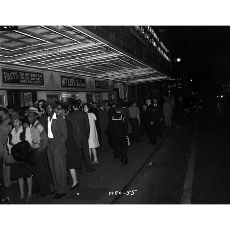A crowd waiting outside of a movie theatre Photo Print (24 x 30 ...