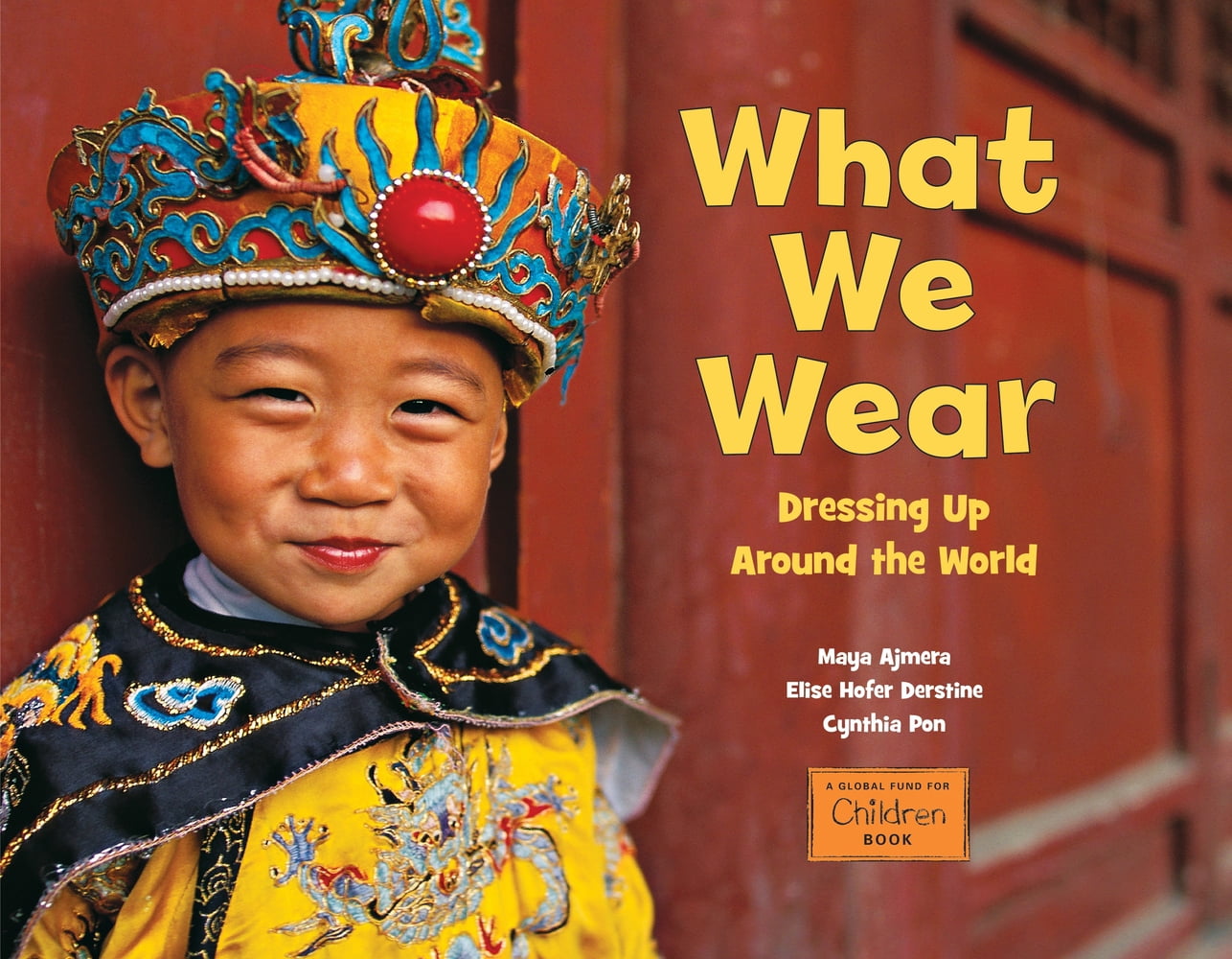 Pre-Owned What We Wear: Dressing Up Around the World (Paperback ...