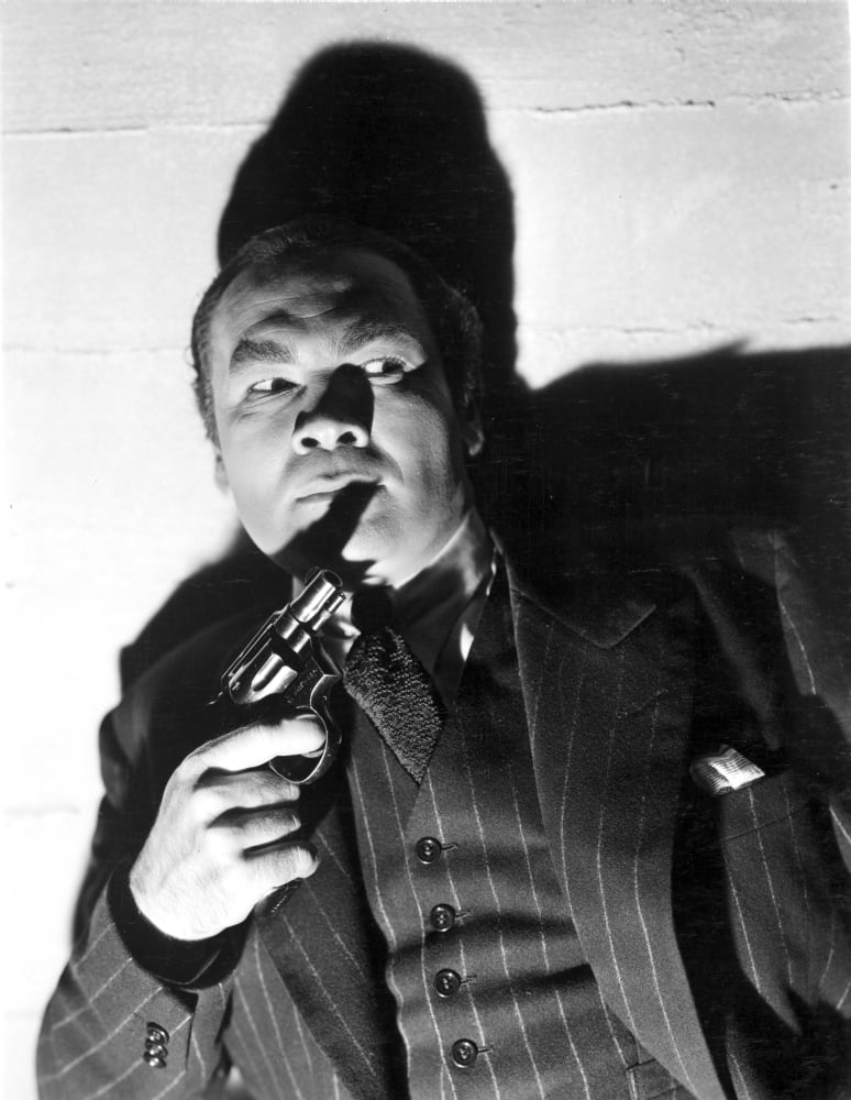 Biberman Abner Posed in Suit With Pistol Photo Print (8 x 10) - Walmart.com