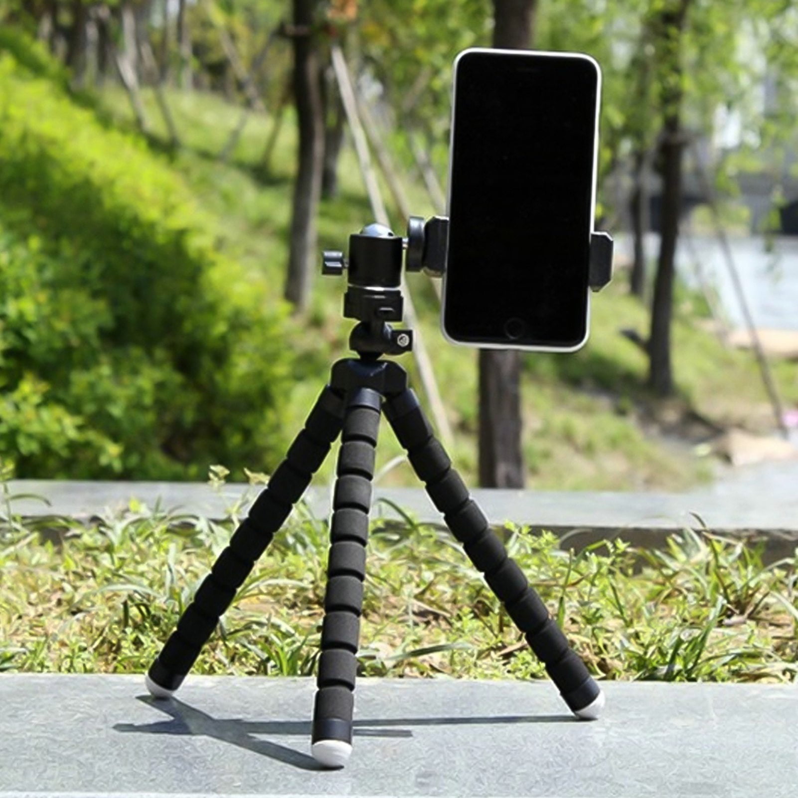 Click here for Estink Adjustable Octopus Tripod Stand With Phone... prices