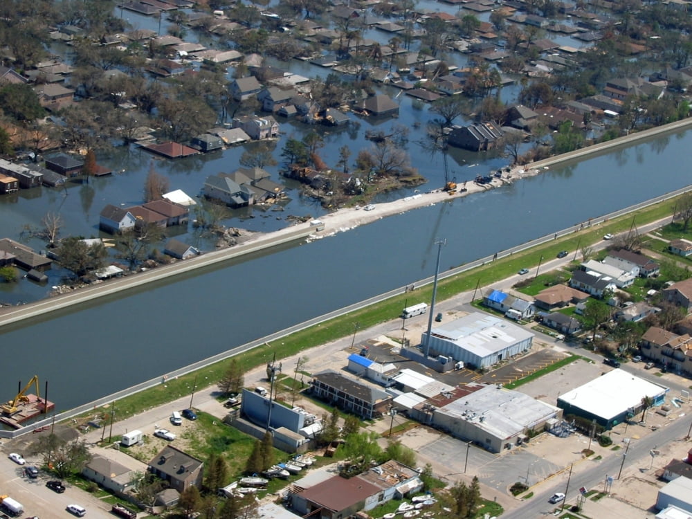 New Orleans After Hurricane Katrina Showing A Levee Break Under Repair ...