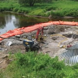 Quick Dam Water Force is a Portable Water Dam that rises with flow of ...