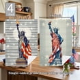 4th of july hand towel A statue of liberty holding a torch in front of ...