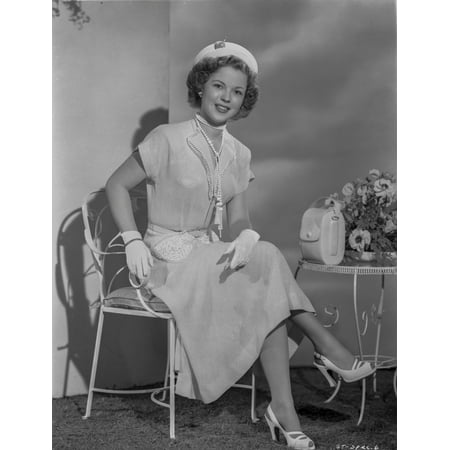 Shirley Temple sitting on a Chair and wearing a Wrap Dress Photo Print ...