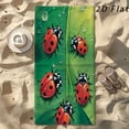 1 beach towel with red ladybug print on green leaves, natural insect ...