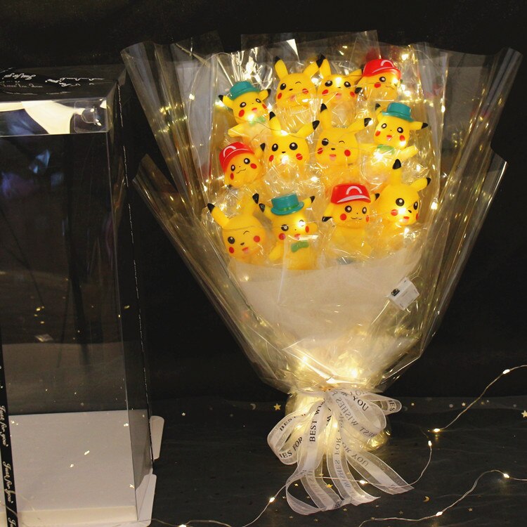 Bonitos juguetes modelo Pikachu de elfo amarillo con flores de jabón ...