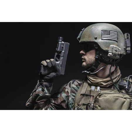 U.S. Marine Corps special operations command Marsoc raider with pistol ...