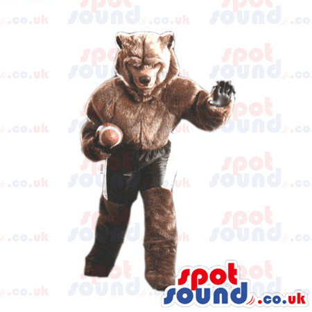 Determined brown bear SPOTSOUND Mascot with the rugby ball and black ...