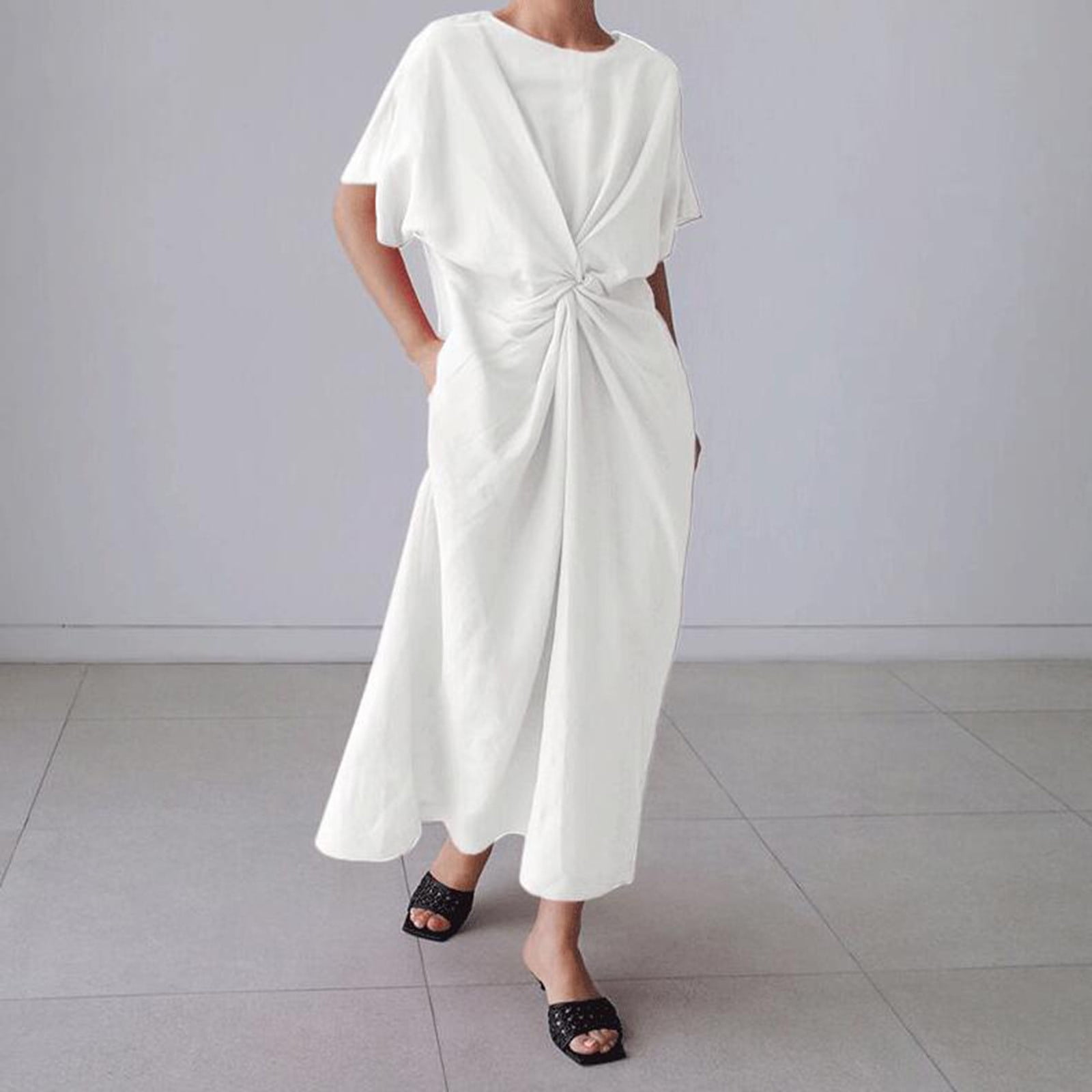 Click here for Leutsin Ladies Short-Sleeved Color Twisted Long Ir... prices