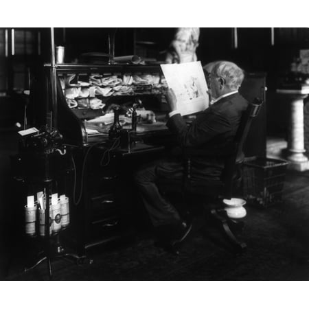 Thomas Edison (1847-1931). /Namerican Inventor. Photographed Seated At ...