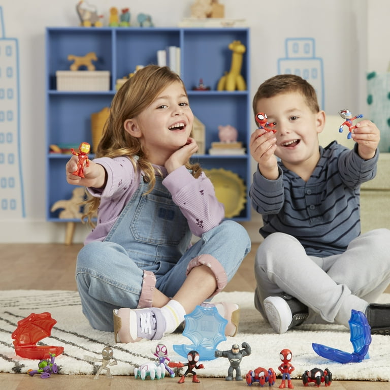 Boys Playing With Action Figures