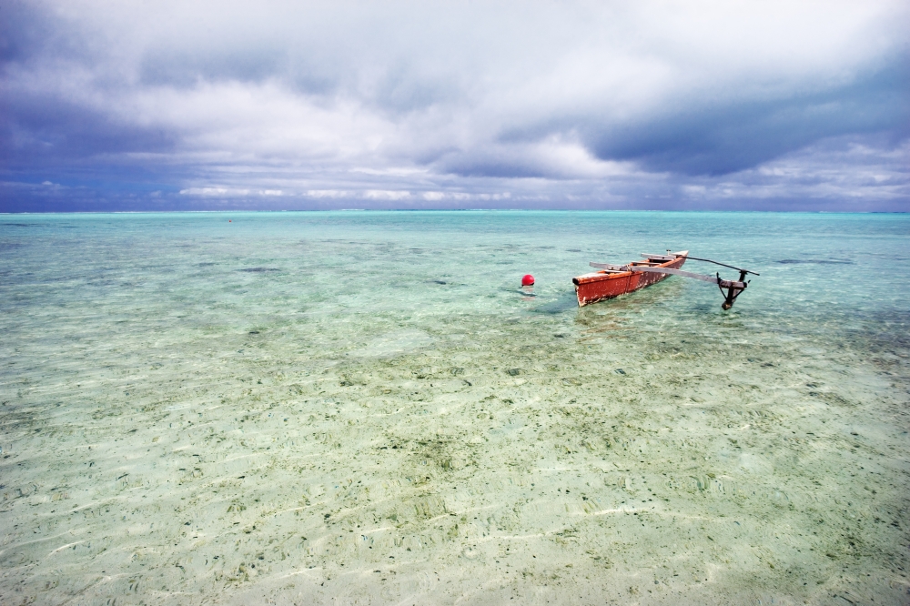 French Polynesia, Tahiti, Bora Bora, Red Outrigger Canoe In Calm ...