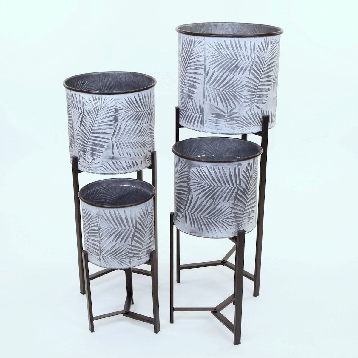 Set Of 4 Silver White Washed Leaf Patterned Buckets On Metal Legs ...